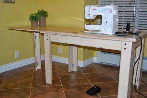 25 Homemade DIY Sewing Table Plans and Ideas
